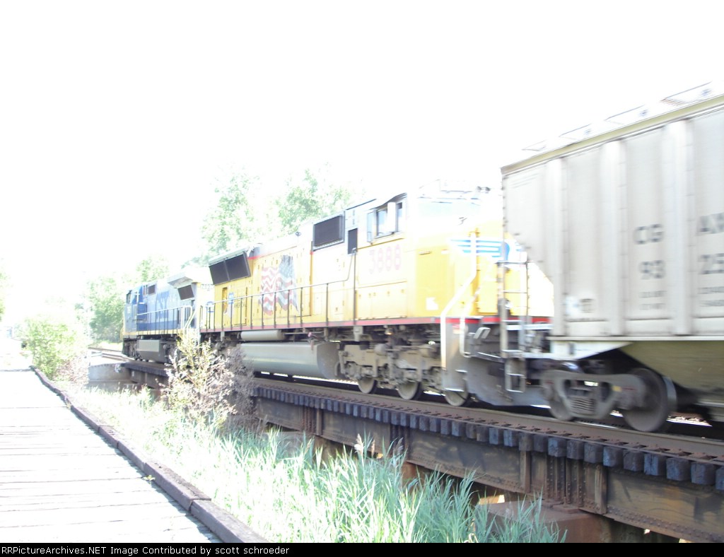 CSX 7897 & UP 3888 head EB with a G-Train